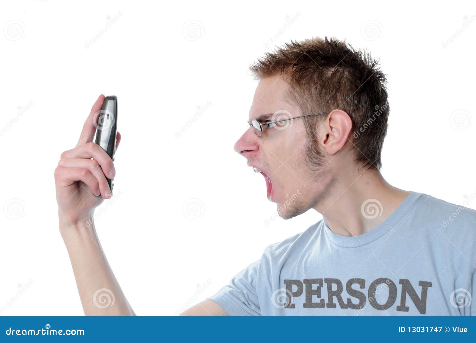 Angry Young Man Screams into Phone Stock Image - Image of square, shout ...