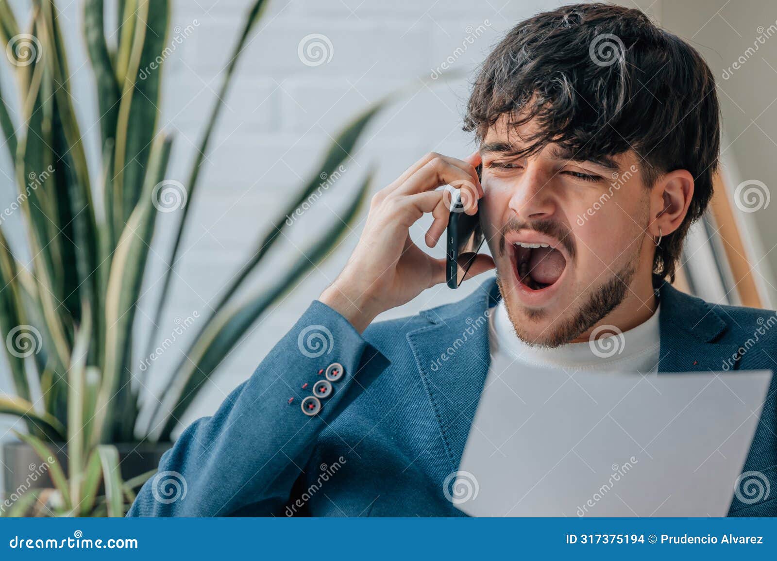 Young Man or Student Claiming on Mobile Phone Stock Photo - Image of ...