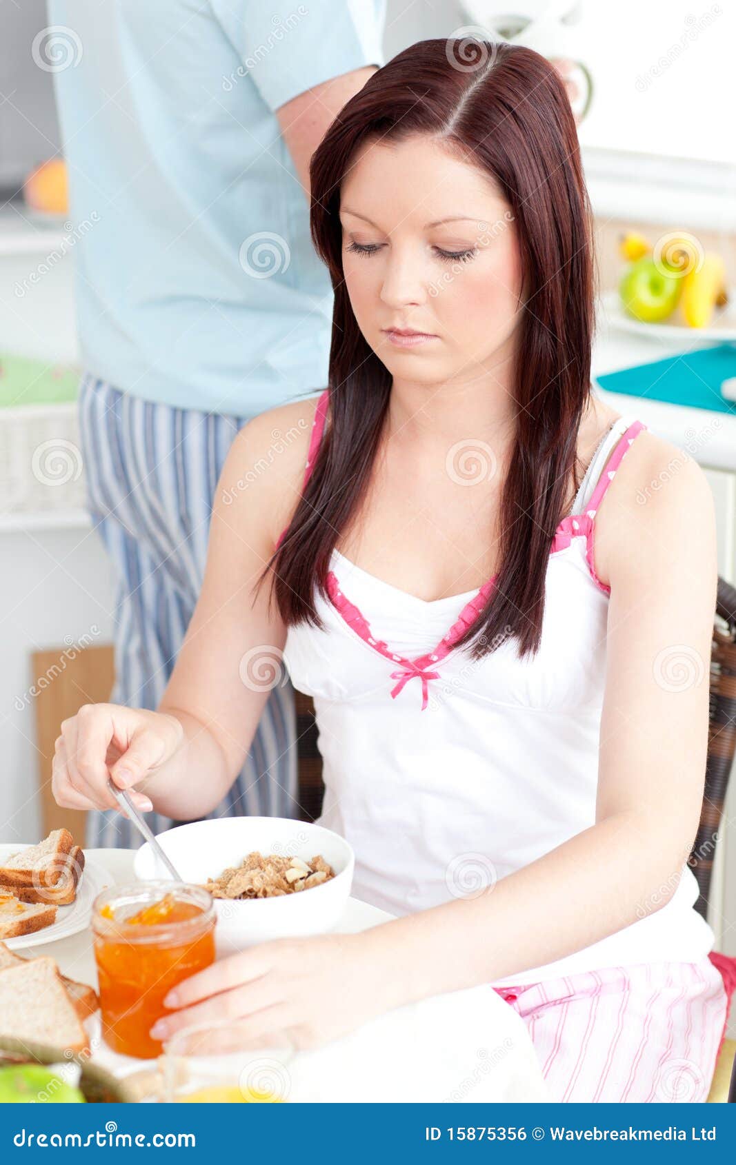 Angry Young Woman Having Breakfast in the Kitchen Stock Photo - Image ...