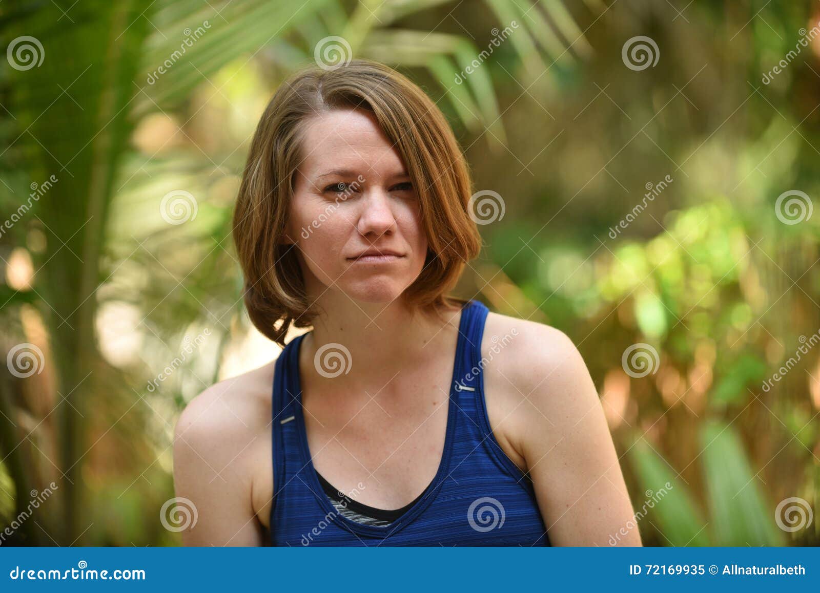 Angry Young Woman with Scowl Stock Image - Image of frown, tank: 72169935
