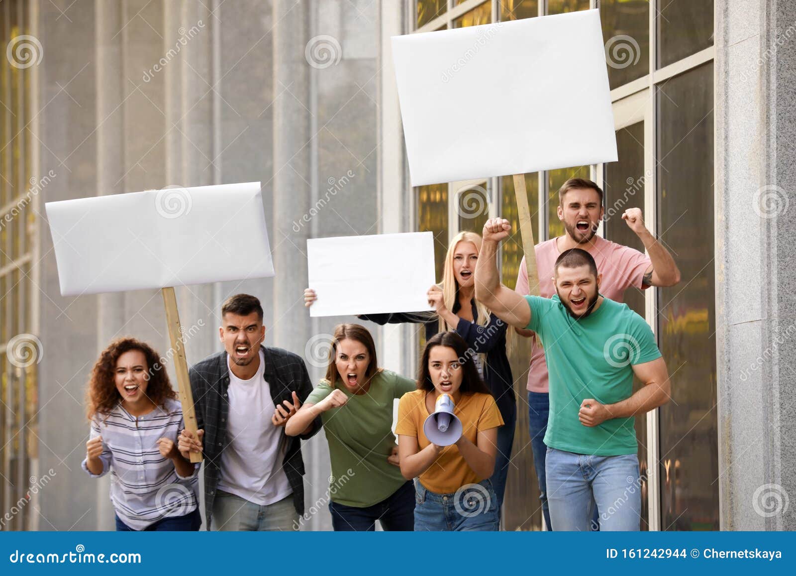 Angry Young Woman with Megaphone Leading Protest Stock Photo - Image of ... Angry Young Woman with Megaphone Leading Protest Stock Photo - Image of ...