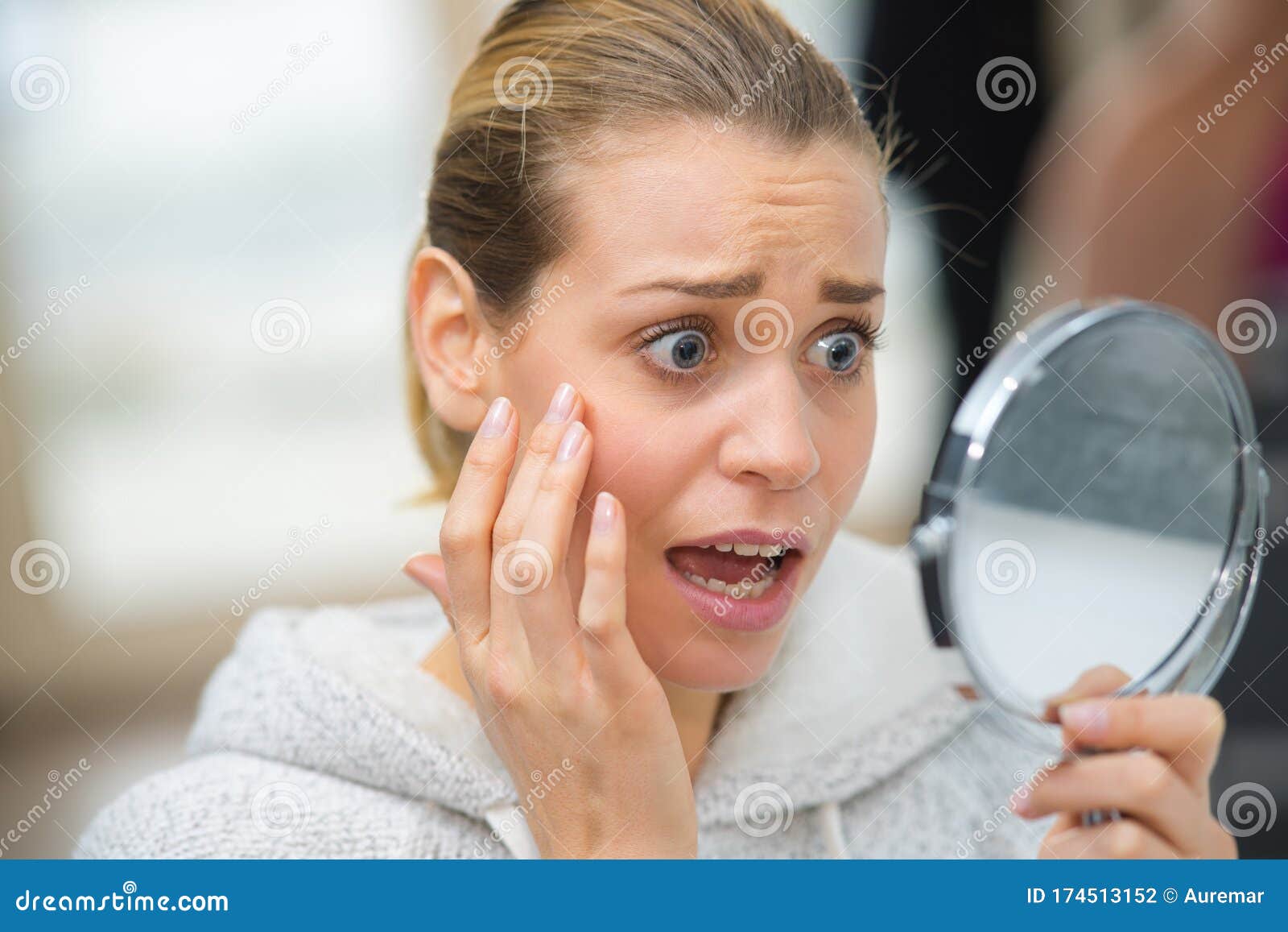 Anguished Young Lady Noticing Wrinkles in Mirror Stock Photo - Image of ...