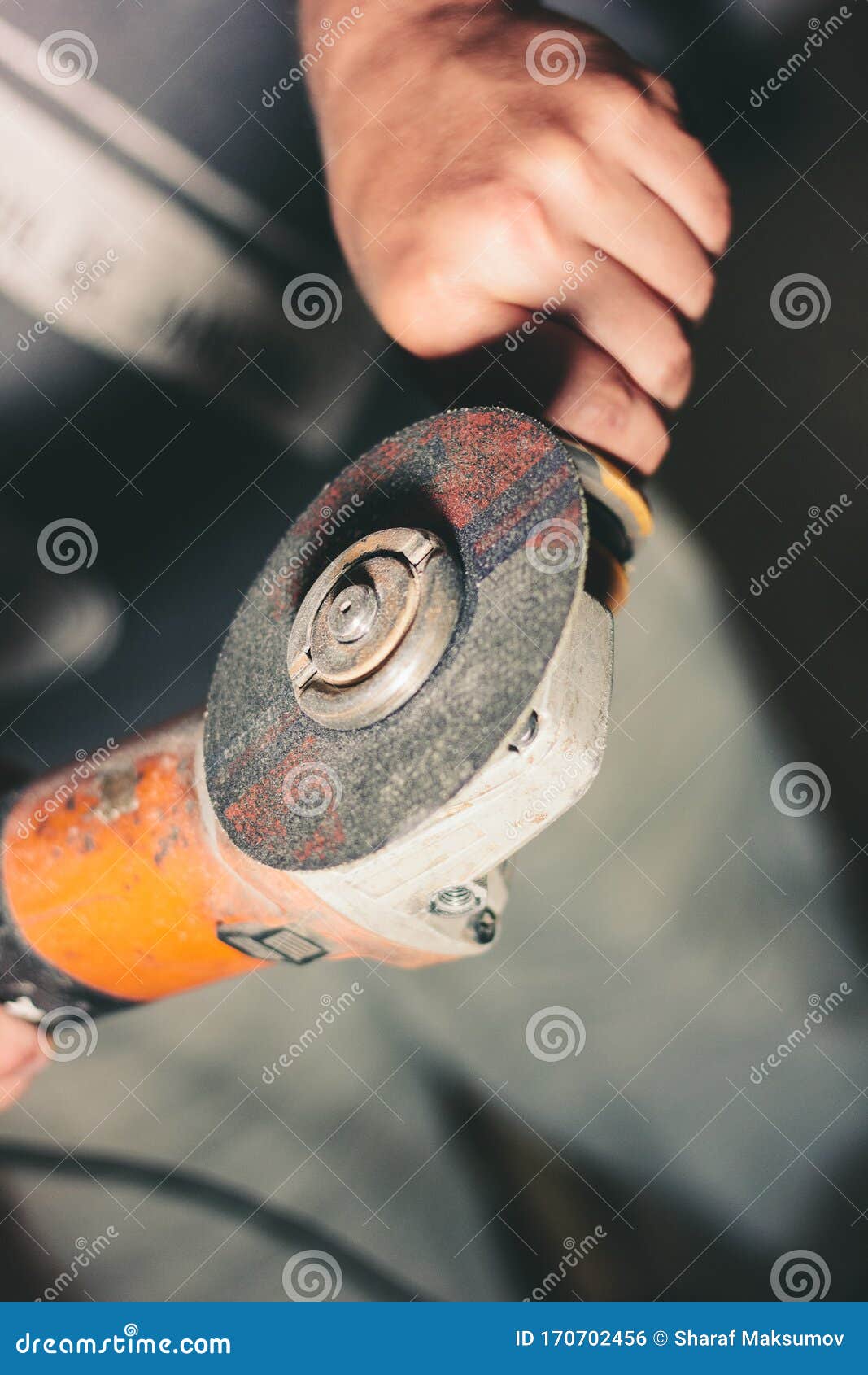 Angular Grinding Machine in a Hands of Carpenter Stock Photo - Image of ...