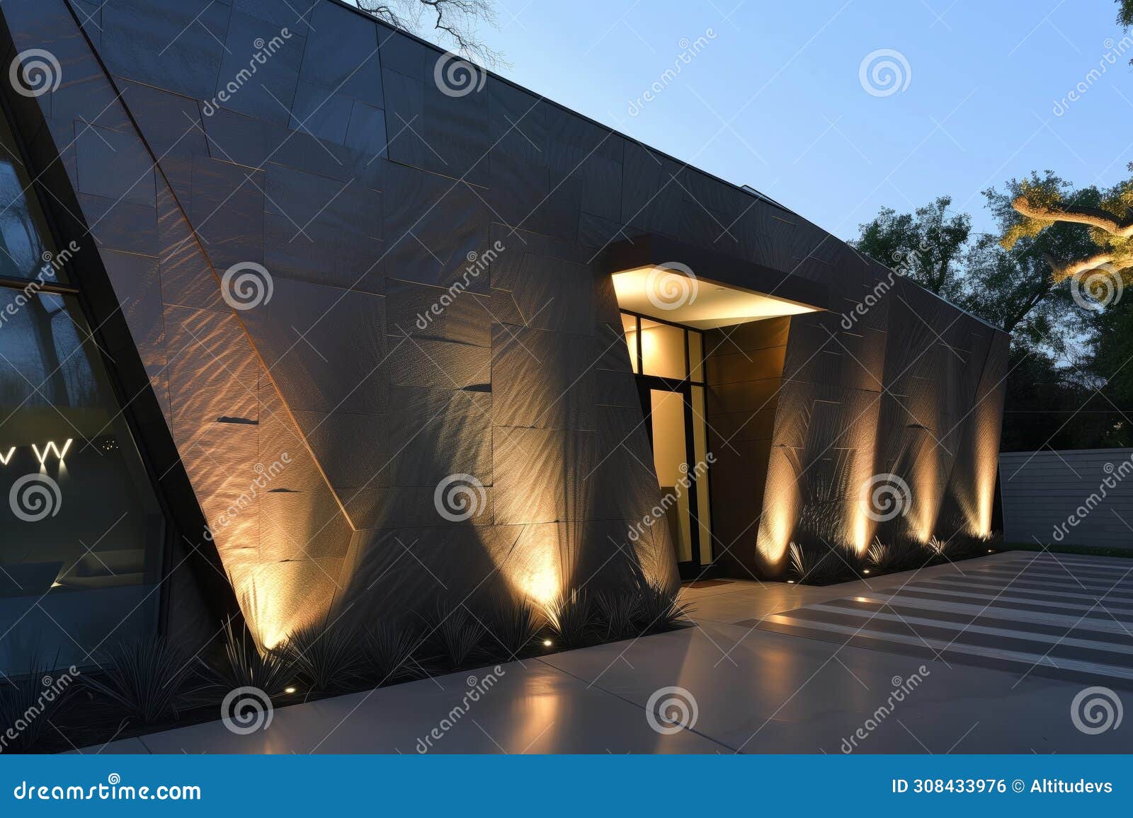 Angular Modern Home Front with Spotlights on Textured Walls Stock Photo ...