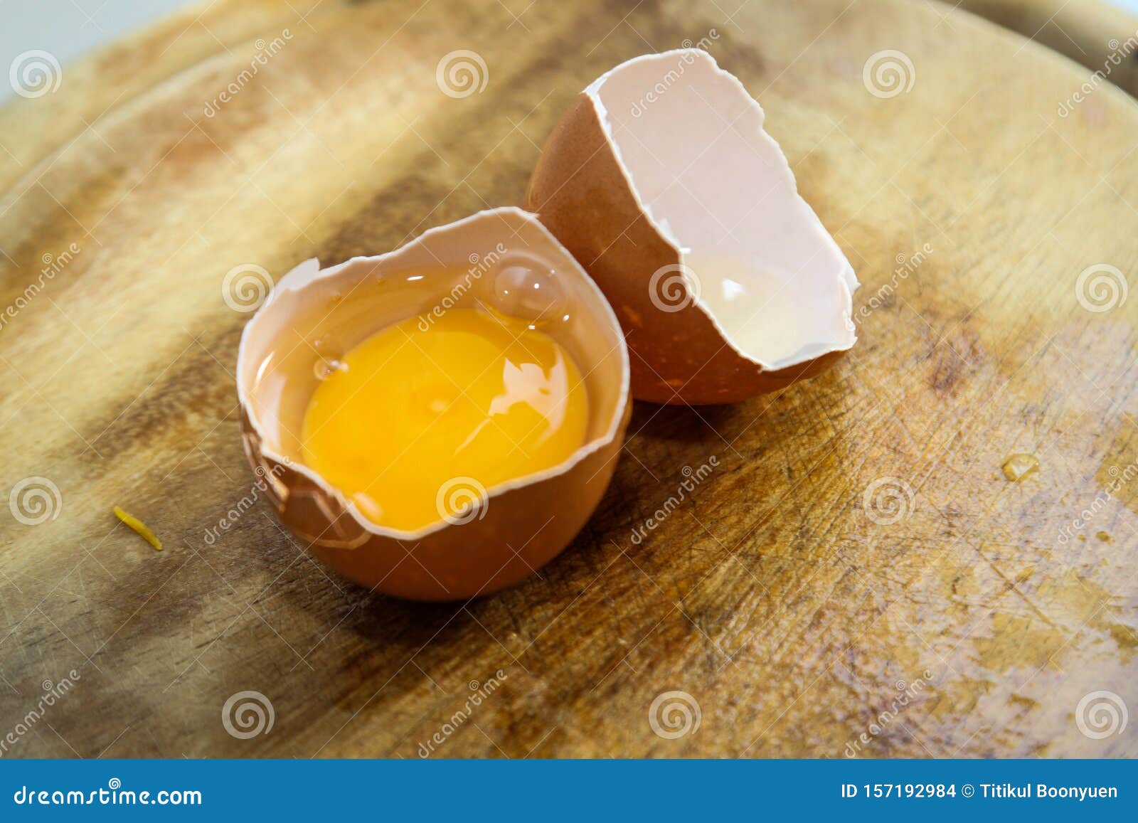 Chicken Eggs and Yellow Yolk Isolated on White Background. Stock Photo ...