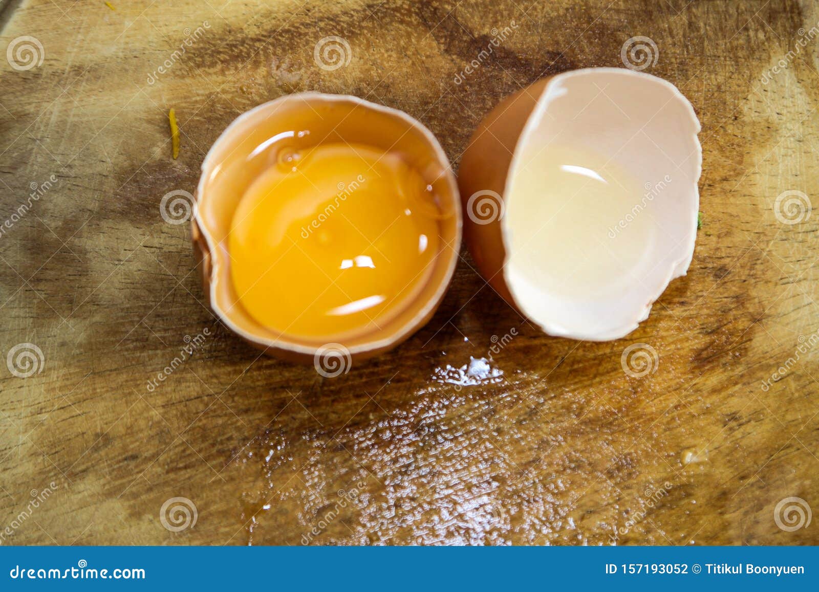 Chicken Eggs and Yellow Yolk Isolated on White Background. Stock Photo ...