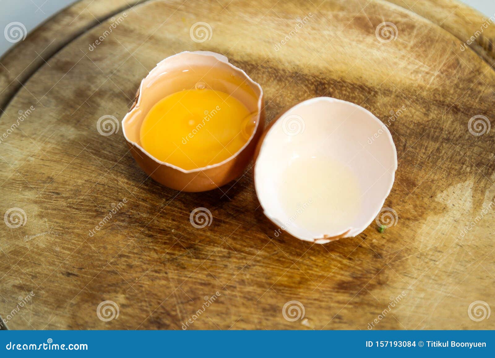 Chicken Eggs and Yellow Yolk Isolated on White Background. Stock Photo ...