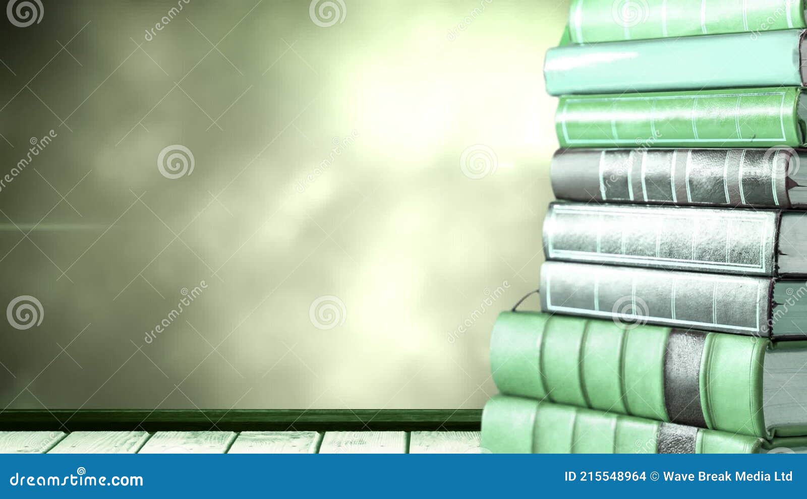 Animation of Stack of Books with Copy Space Over Glowing Green Lights ...