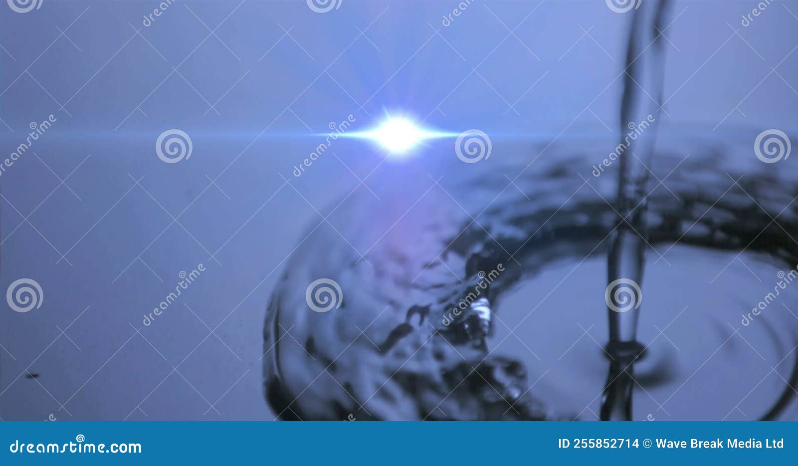 Animation of Water Drops Dropping into Blue Water with Glowing Light ...