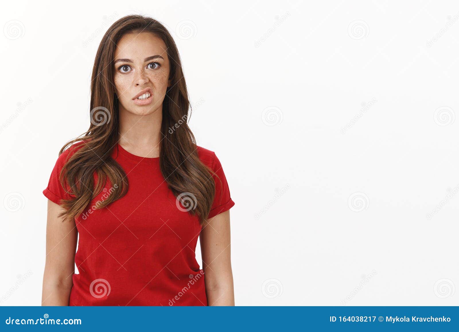 Annoyed And Displeased Cute Feminine Redhead Curly Woman Shut Ears With