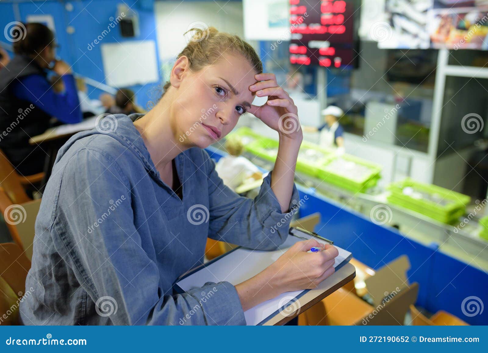 Annoyed Female Clerk Working in Supermarket Stock Photo - Image of ...