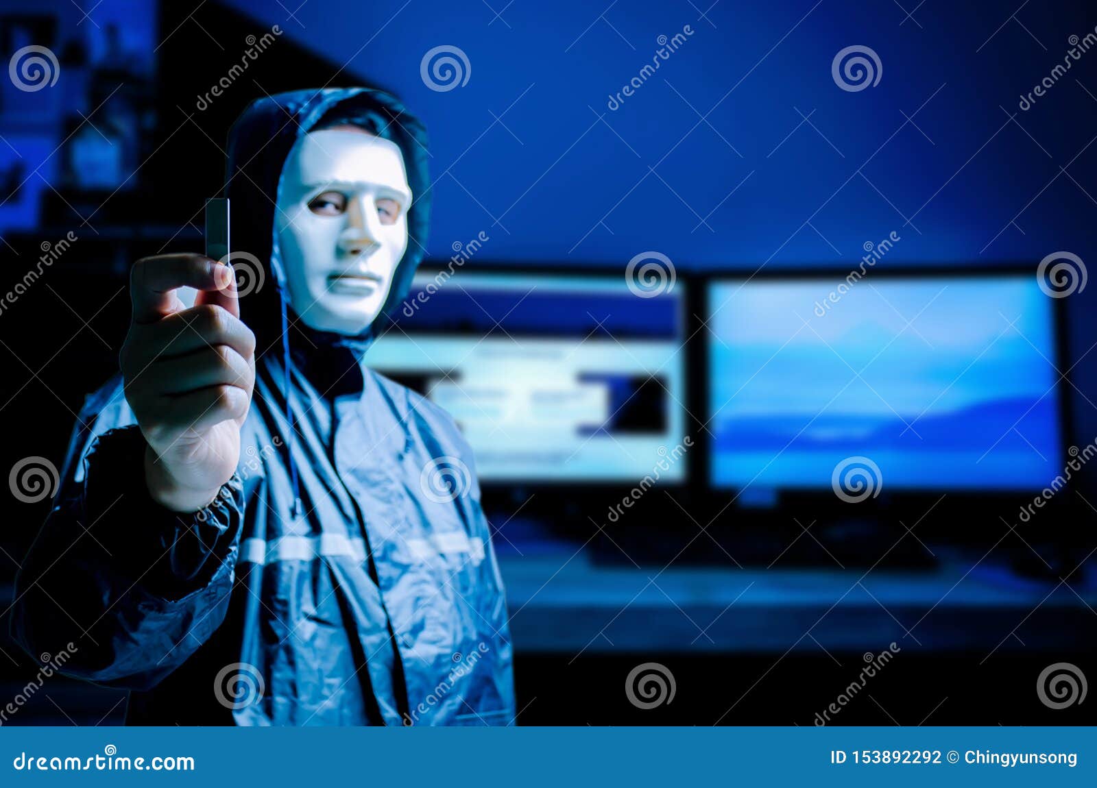 Anonymous Computer Hacker in White Mask and Hoodie. Obscured Dark Face ...