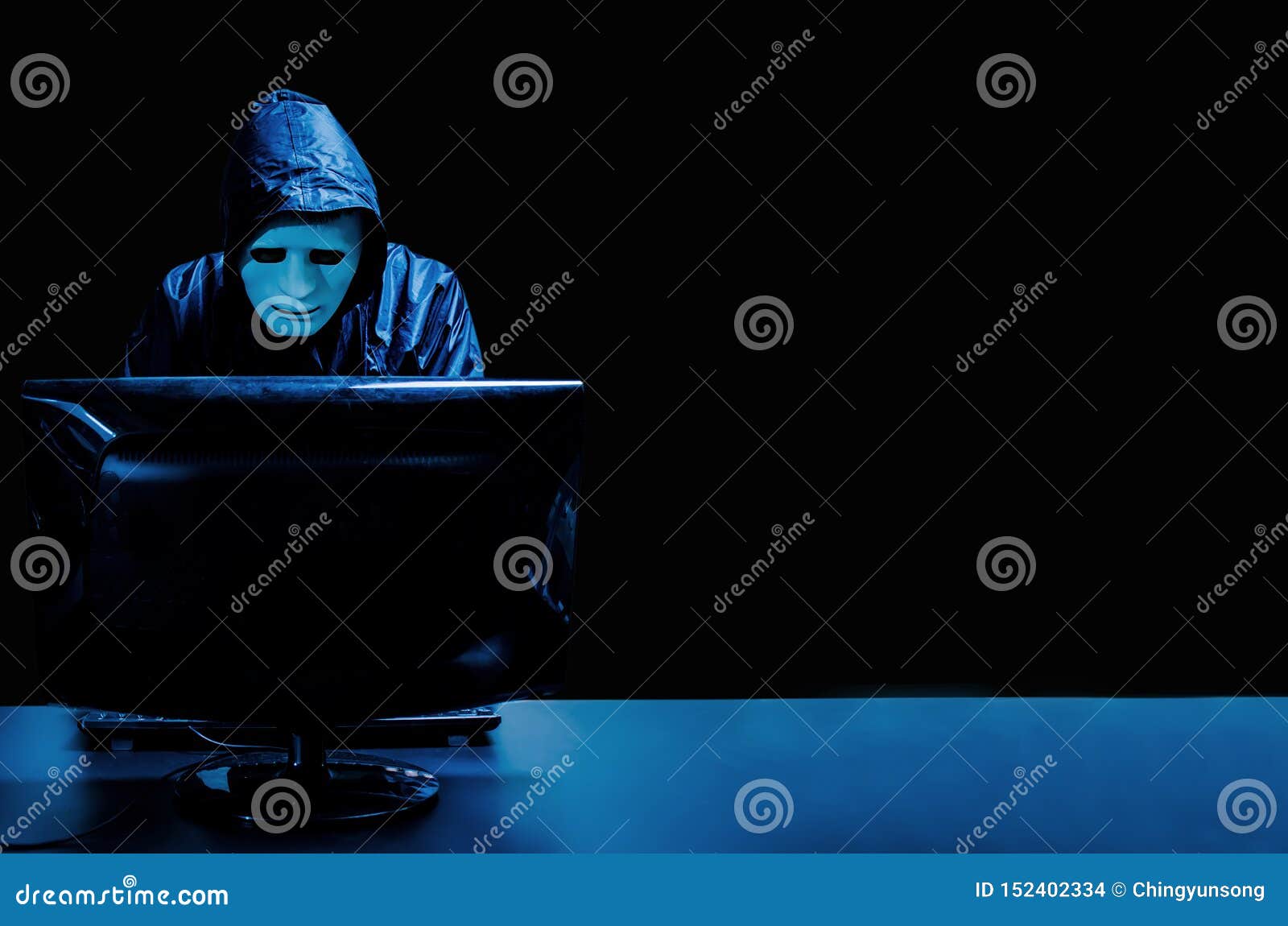 Anonymous Computer Hacker in White Mask and Hoodie. Obscured Dark Face ...
