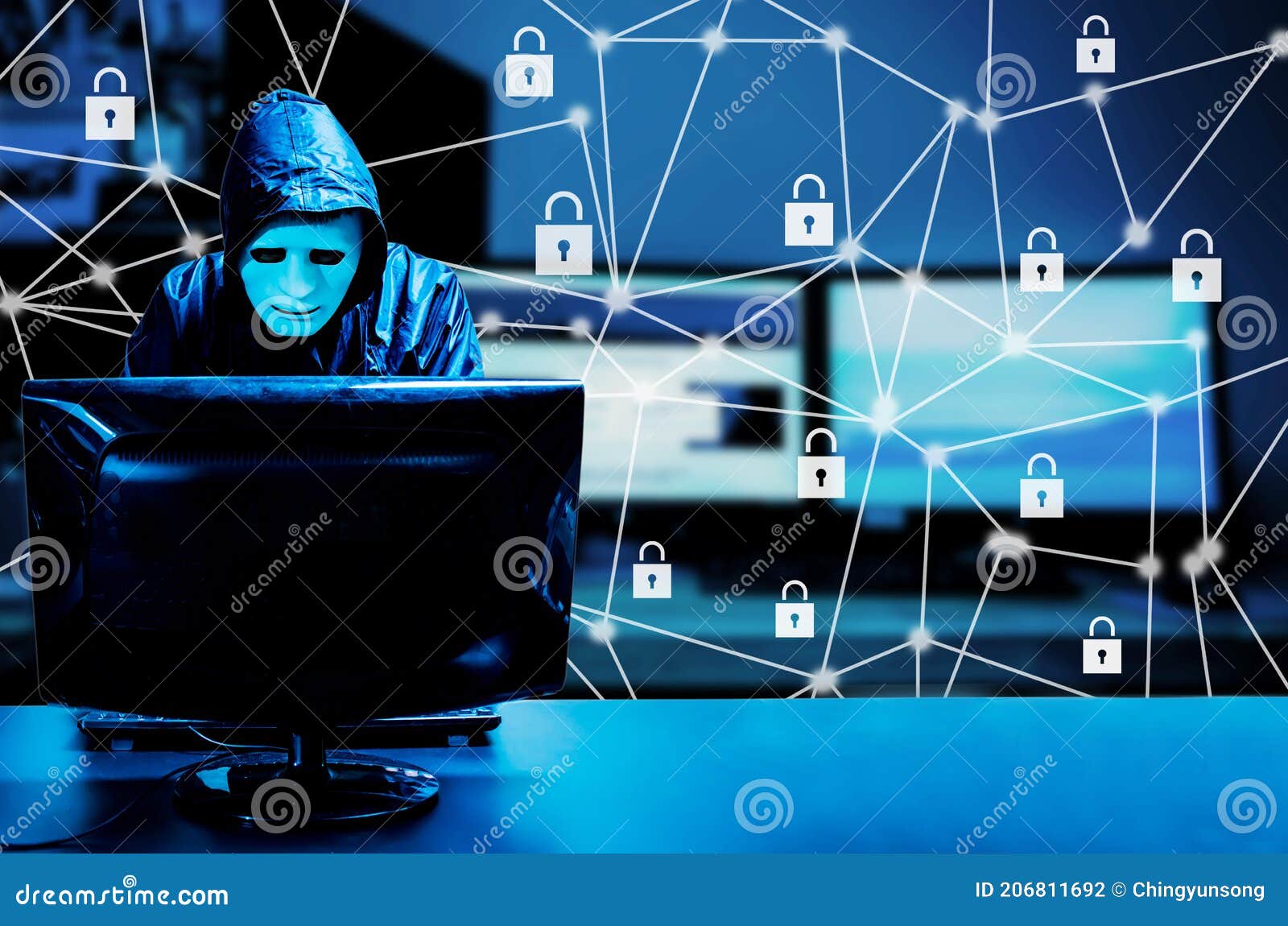 Anonymous Computer Hacker Standing in the Middle and Hacking it with ...