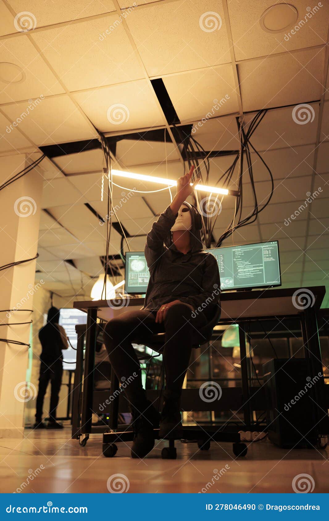 Anonymous Hacker Coding Malware in Ar, Making Hand Gesture Stock Photo ...