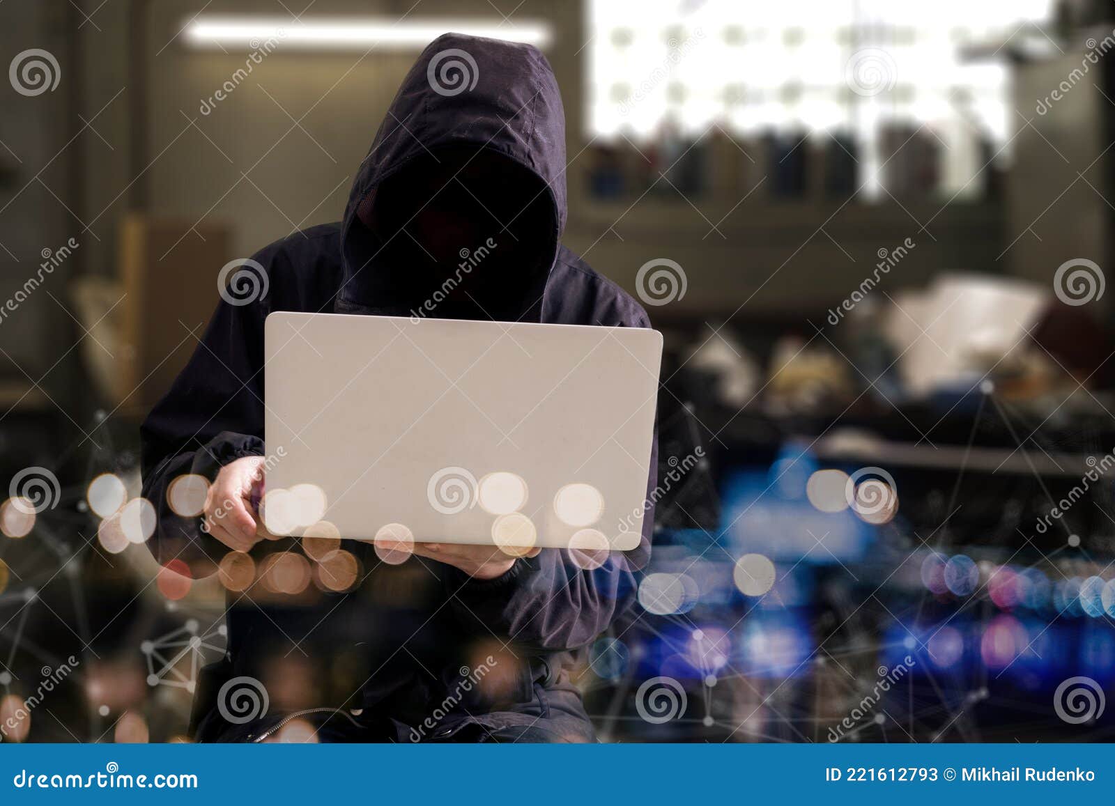 A Anonymous Hacker Person in the Hood with Computer, Digital ...