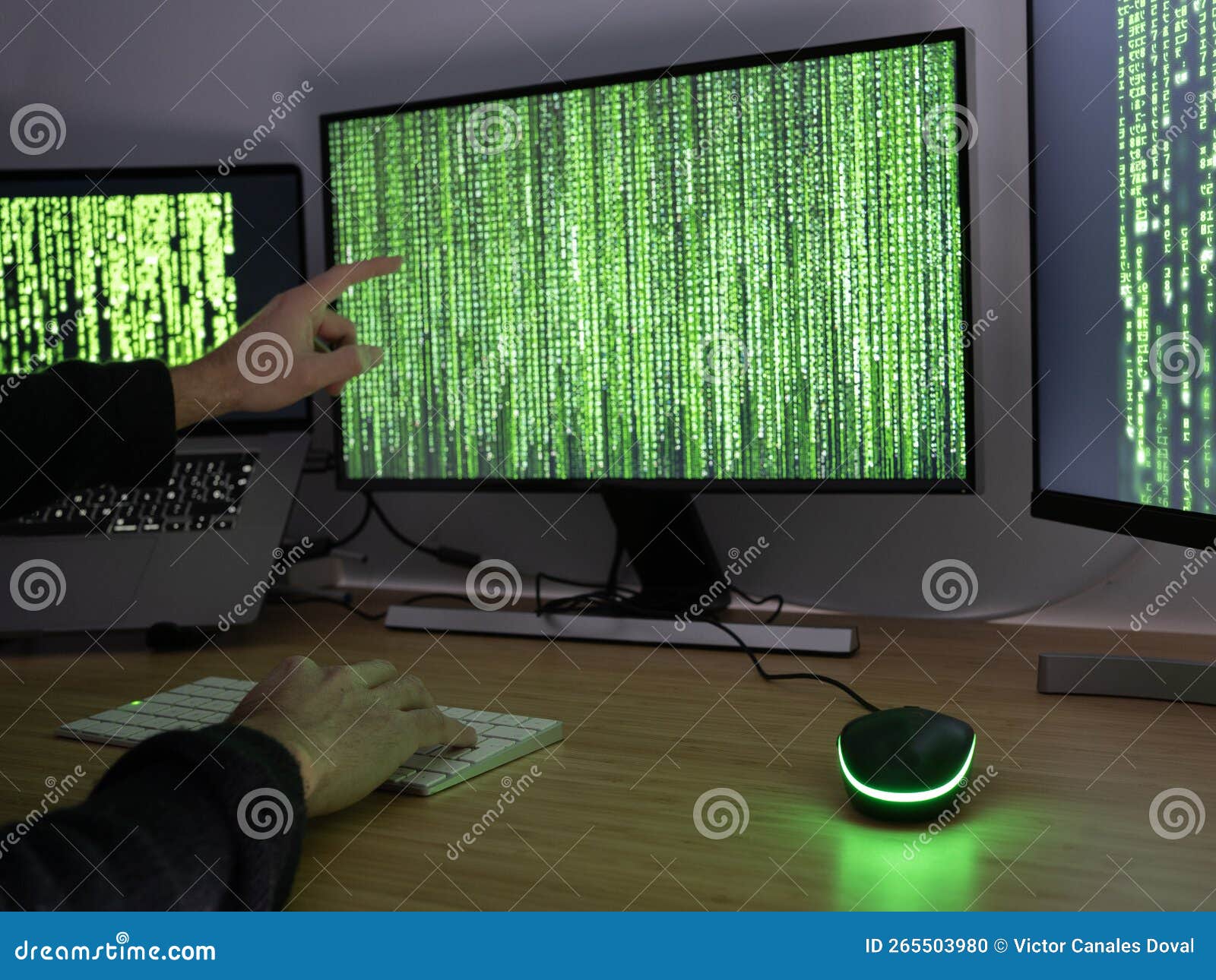 Anonymous Hacker Pointing with Finger on the Screen. Internet Security ...