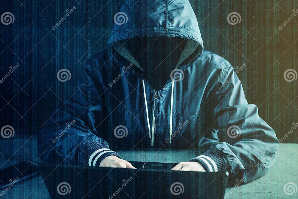 Anonymous Hacker Programmer Uses a Laptop To Hack the System. Stealing ...