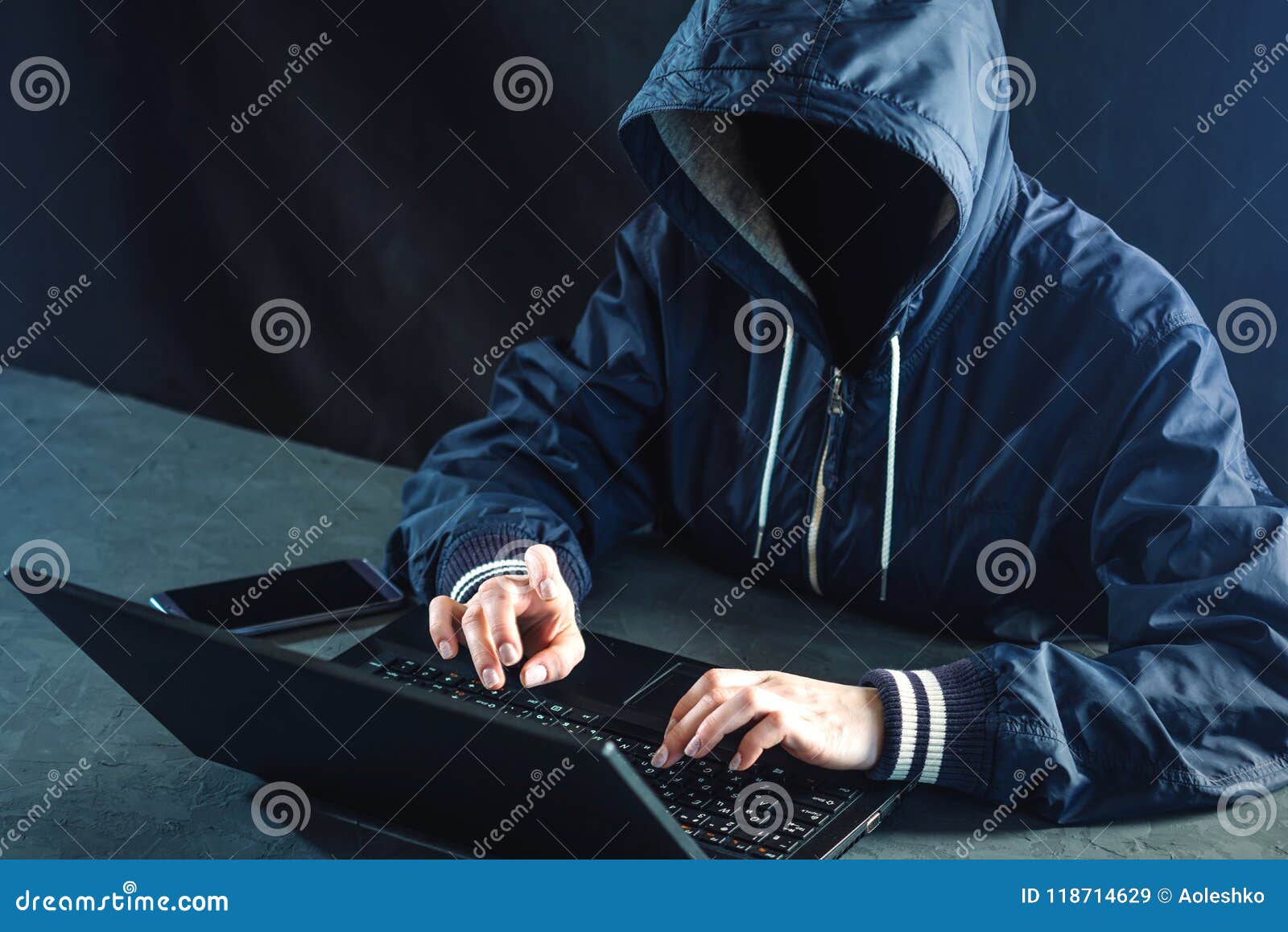 Anonymous Hacker Programmer Uses a Laptop To Hack the System. Stealing Personal Data. Infection ...