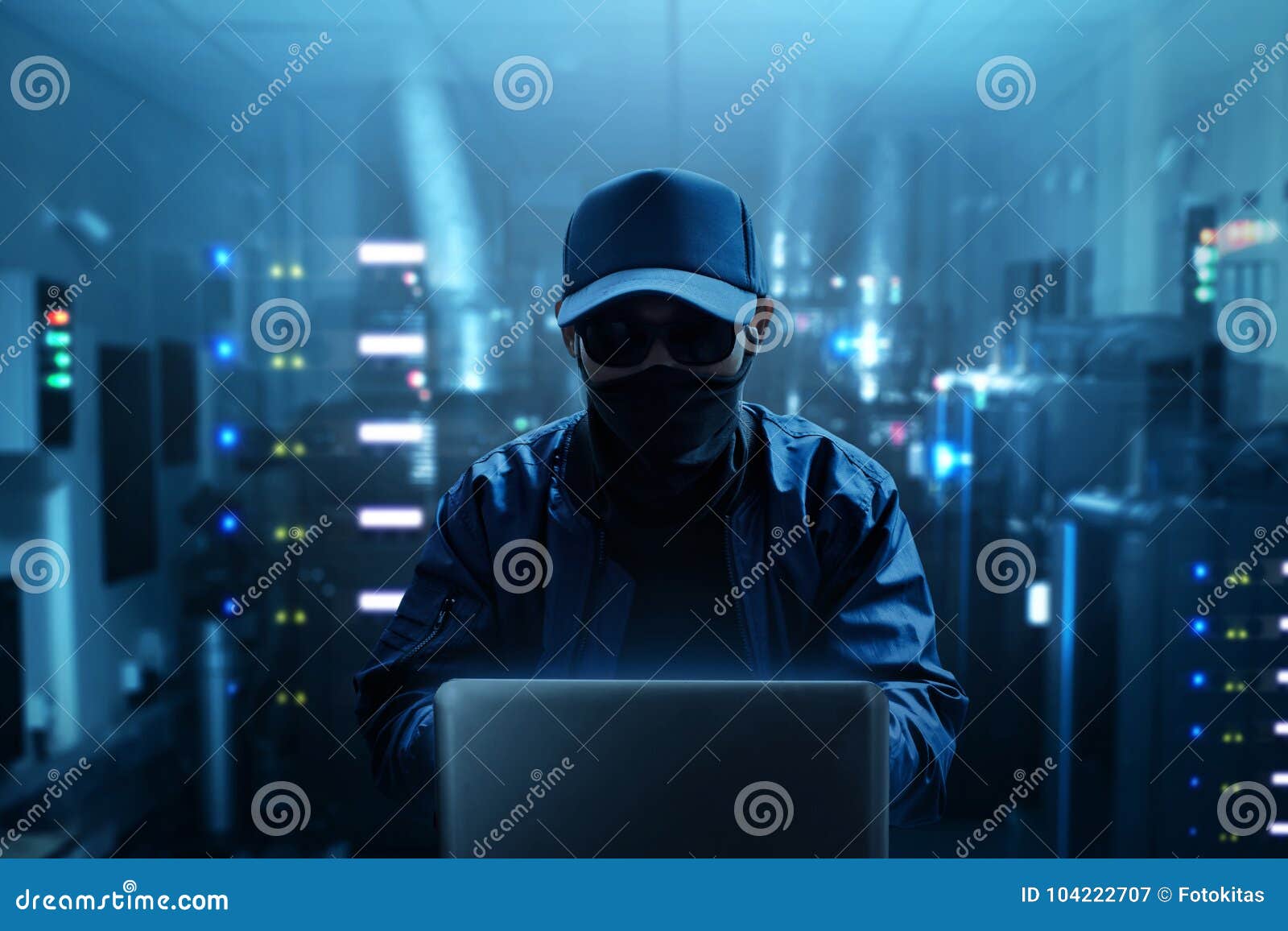 Anonymous Hacker Using Laptop in Server Room Stock Image - Image of ...