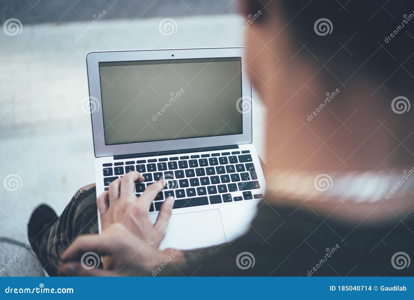 Anonymous Male Remote Worker Using Keyboard of Blank Screen Laptop ...