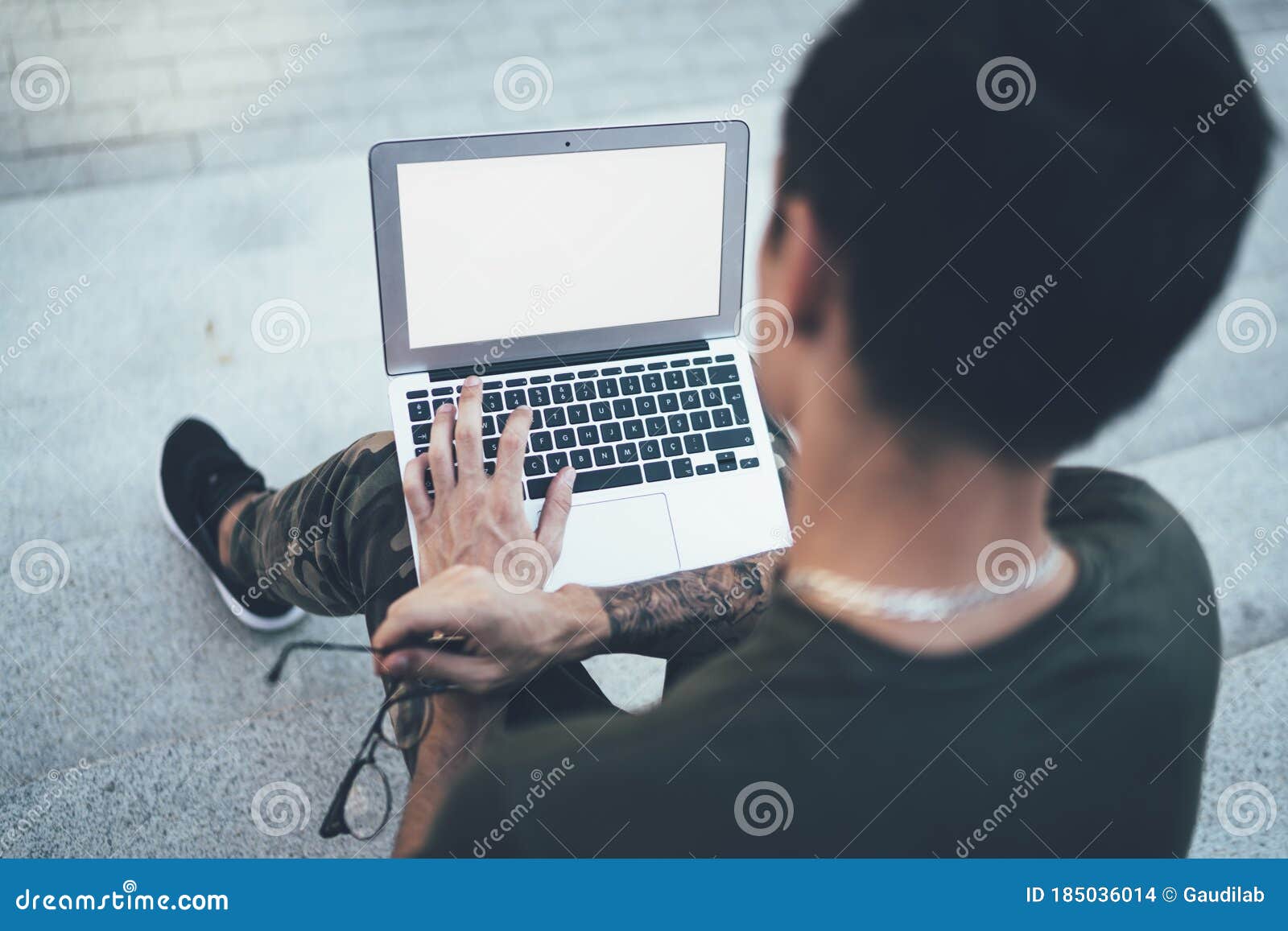 Anonymous Male Remote Worker Using Keyboard of Blank Screen Laptop ...
