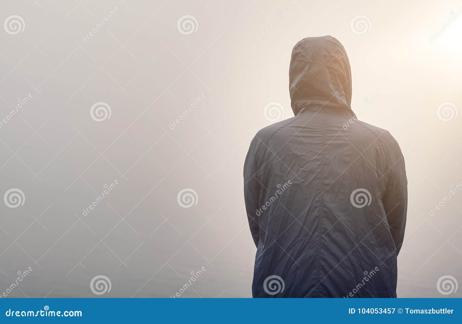 An Anonymous Man in Hooded Jacket Backlit Stock Image - Image of ...