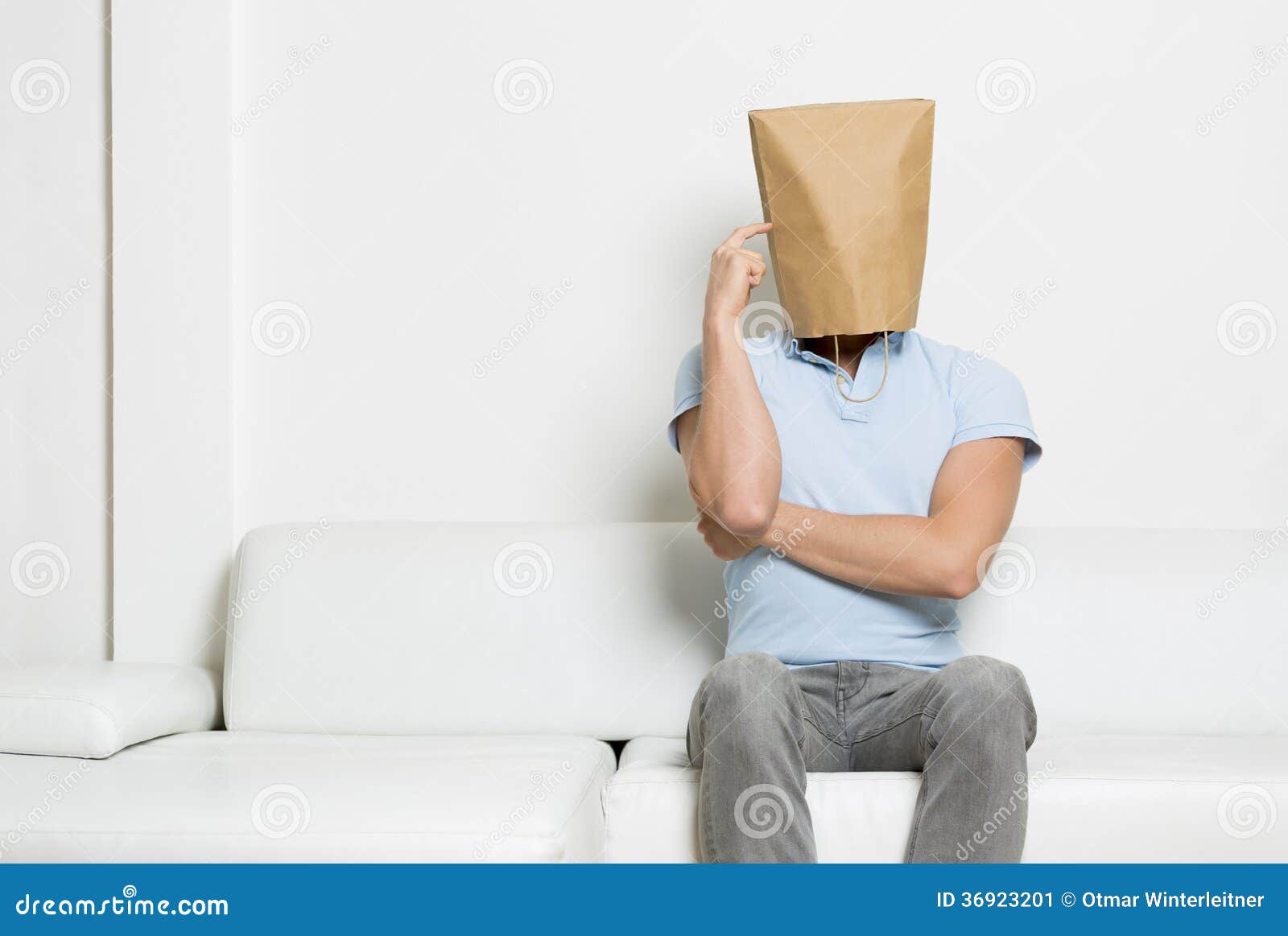 Anonymous Man Sitting on Sofa and Thinking. Stock Image - Image of ...