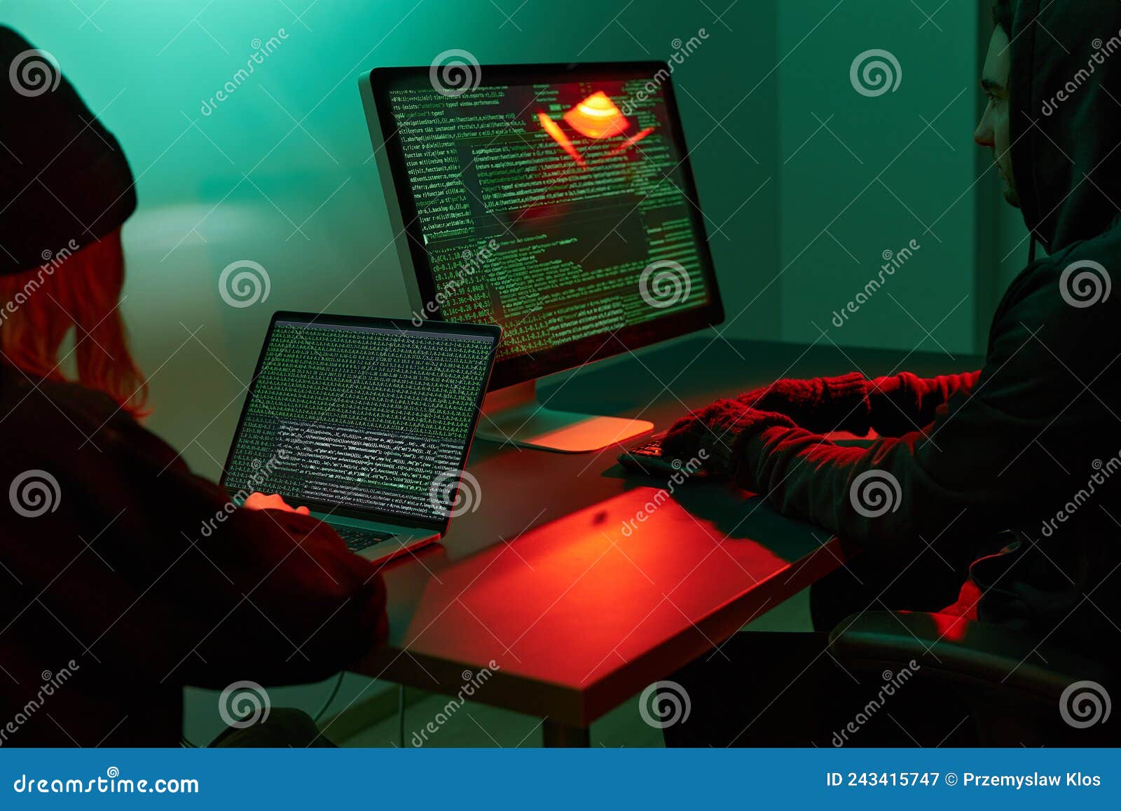Anonymous People Using Computer And Programming To Break Code Cyber