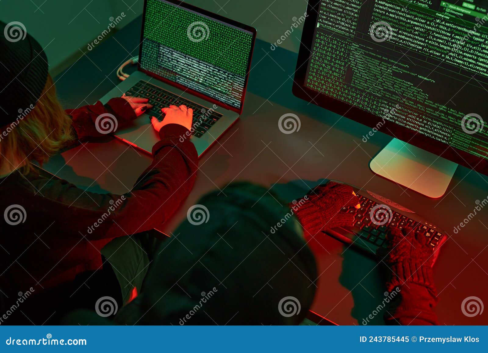 Anonymous People Using Computer And Programming To Break Code Cyber