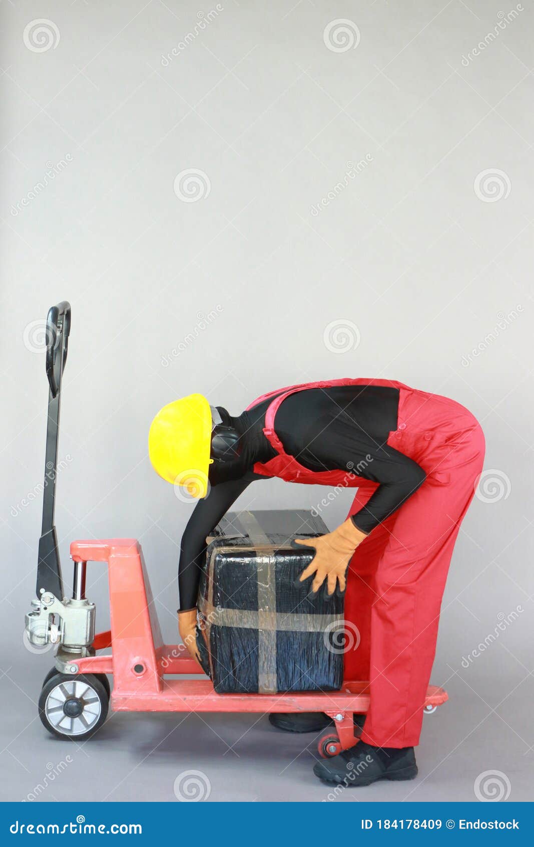 Anonymous Worker Lifting Heavy Package. Profile View. Stock Image ...