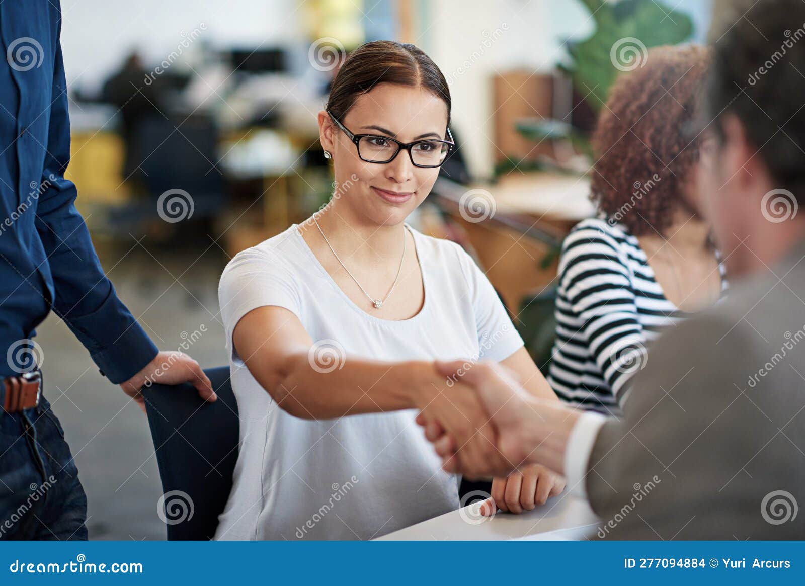 Another Job Well Done. Colleagues Shaking Hands in an Office. Stock ...