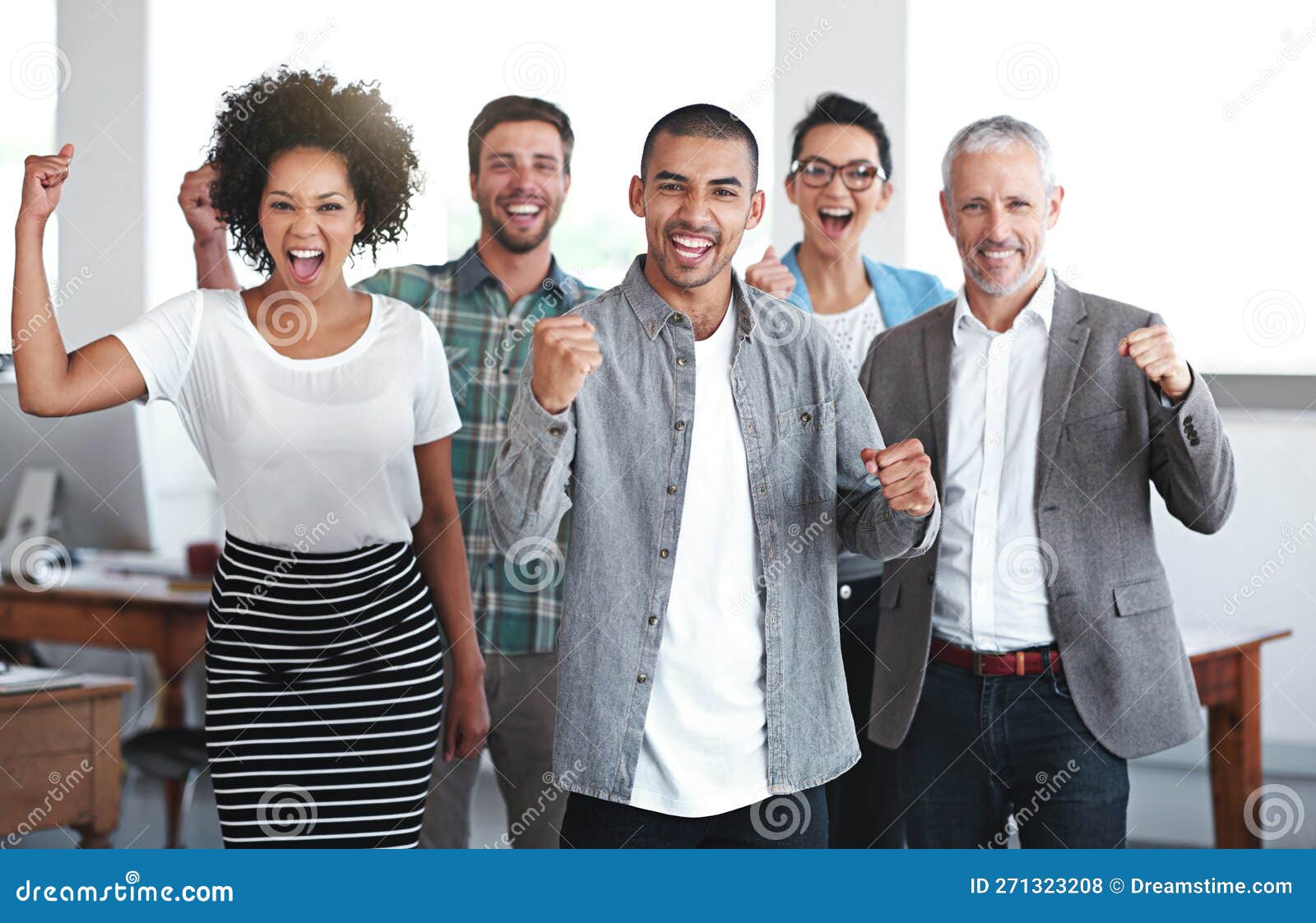 Another Project Aced. Portrait of a Group of Colleagues Cheering while ...