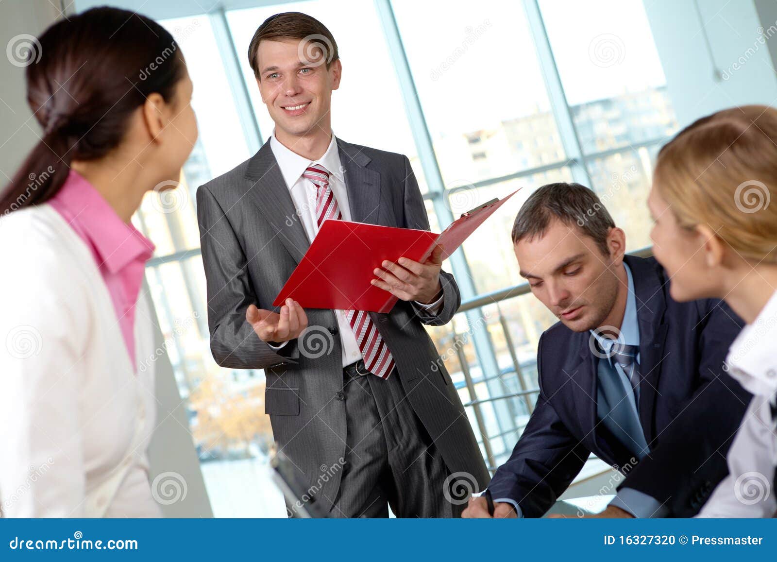 Answering questions stock photo. Image of holding, businesspeople ...