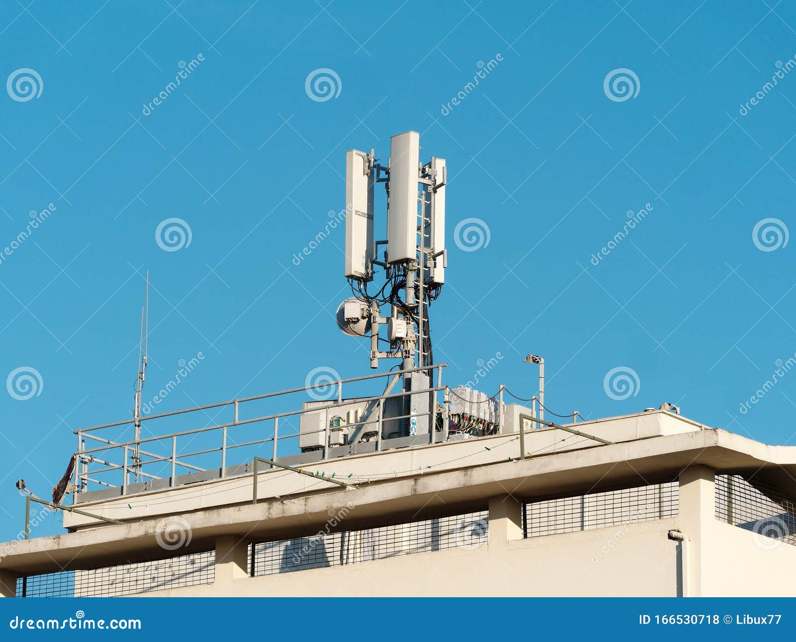 Antenna Mobile Communication on the Top of a Building Stock Photo ...