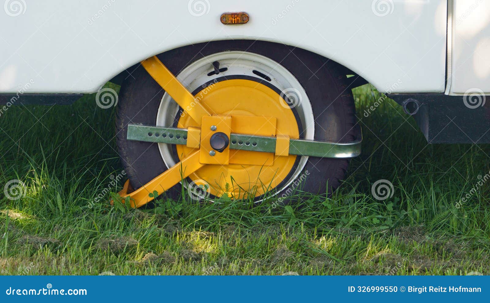 Anti Theft Device on a Tire Stock Photo - Image of road, parked: 326999550