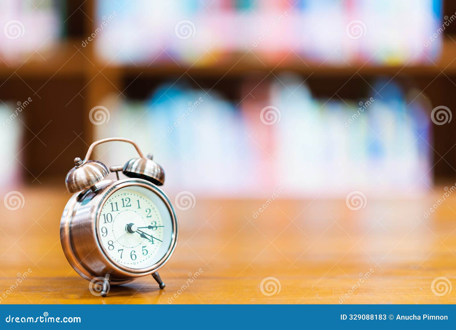 Antique Alarm Clock on the Wood in the Library Stock Image - Image of ...