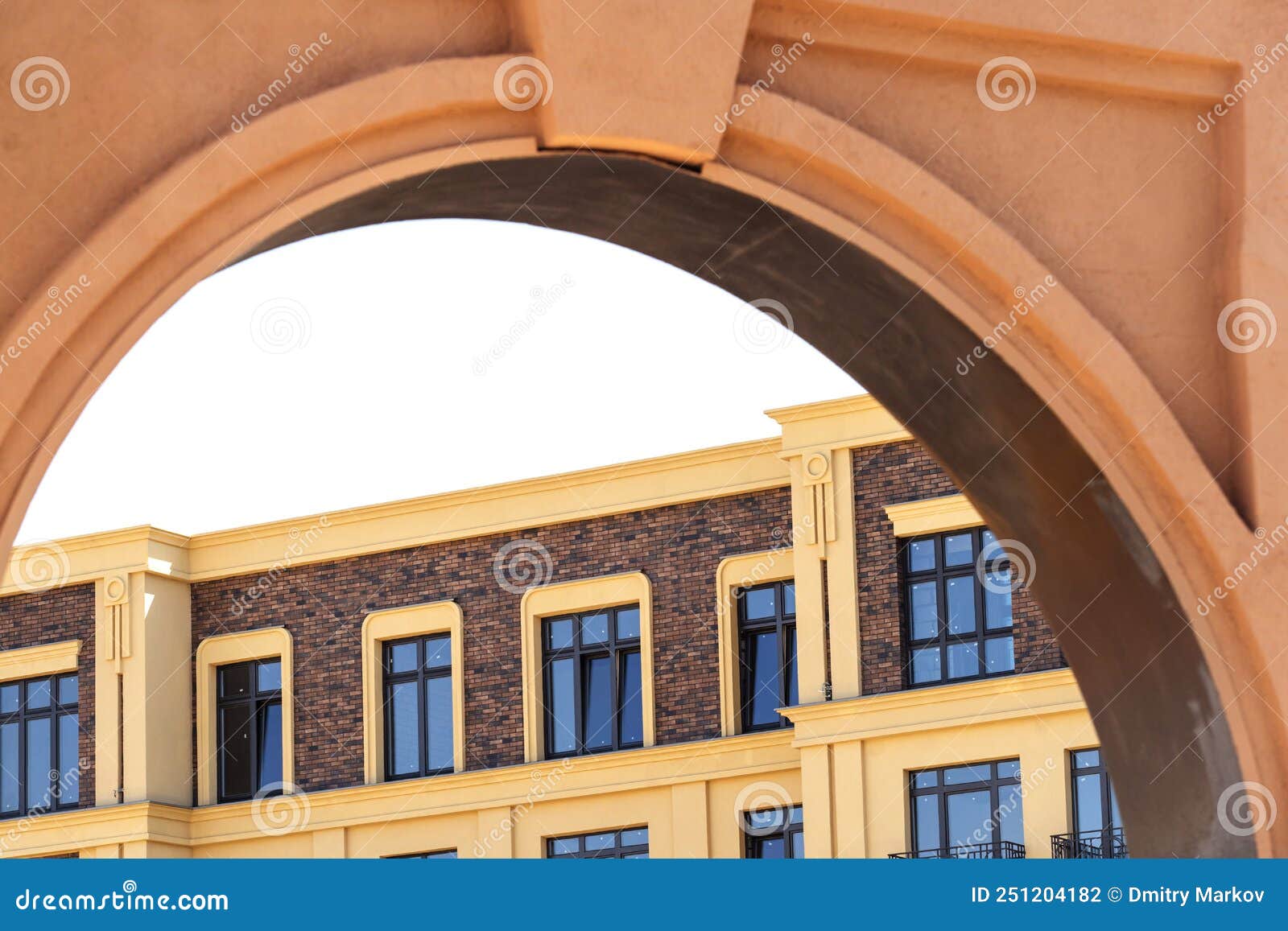 Antique Arch Against the Backdrop of a Modern Building Built in Retro ...