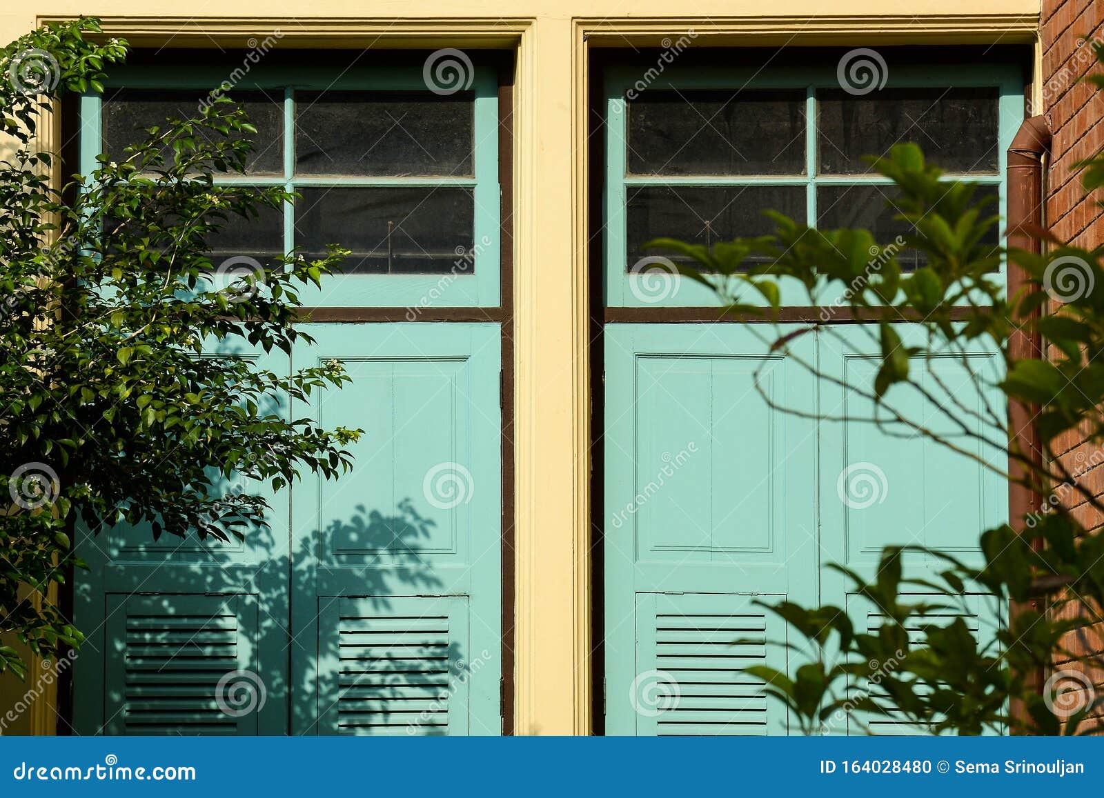 Antique Blue Wood Window at Old Brick Building. Stock Photo - Image of ...