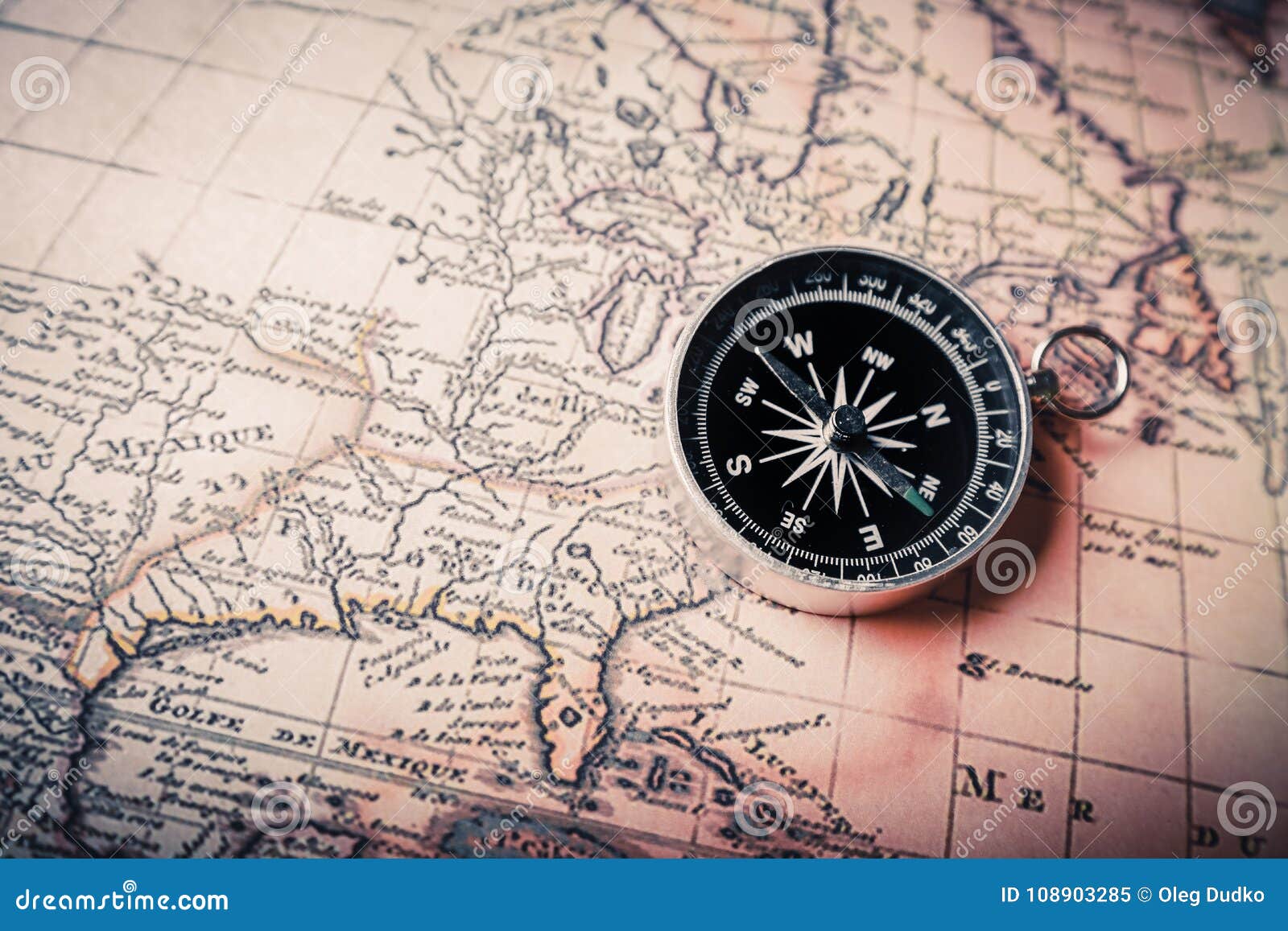 Brass Antique Compass on Old Brown Map Stock Image - Image of bronze ...