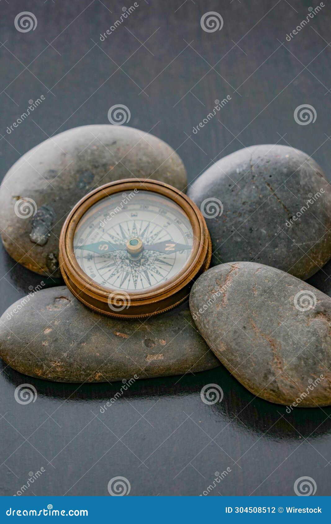 Antique Brass Compass Laying on Top of Rocks. Stock Photo - Image of ...