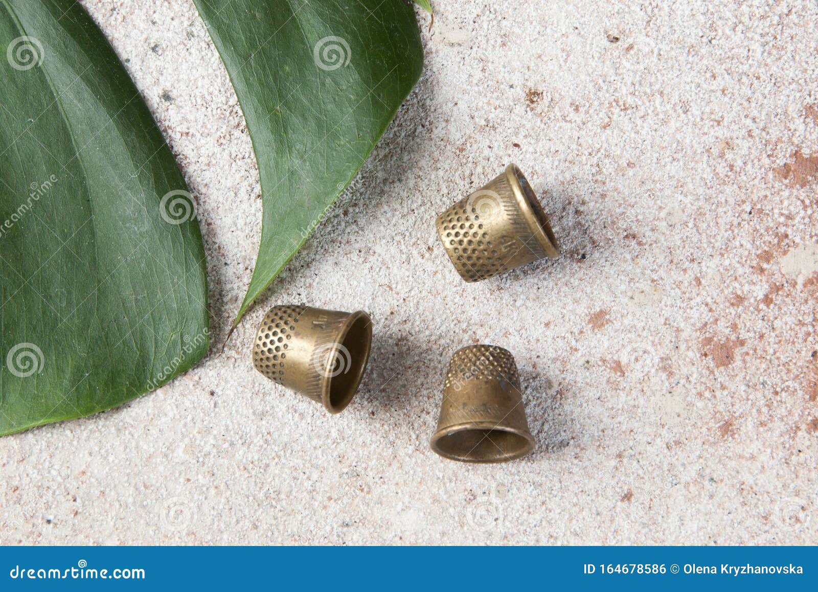 Antique brass thimbles stock photo. Image of tool, leaf - 164678586