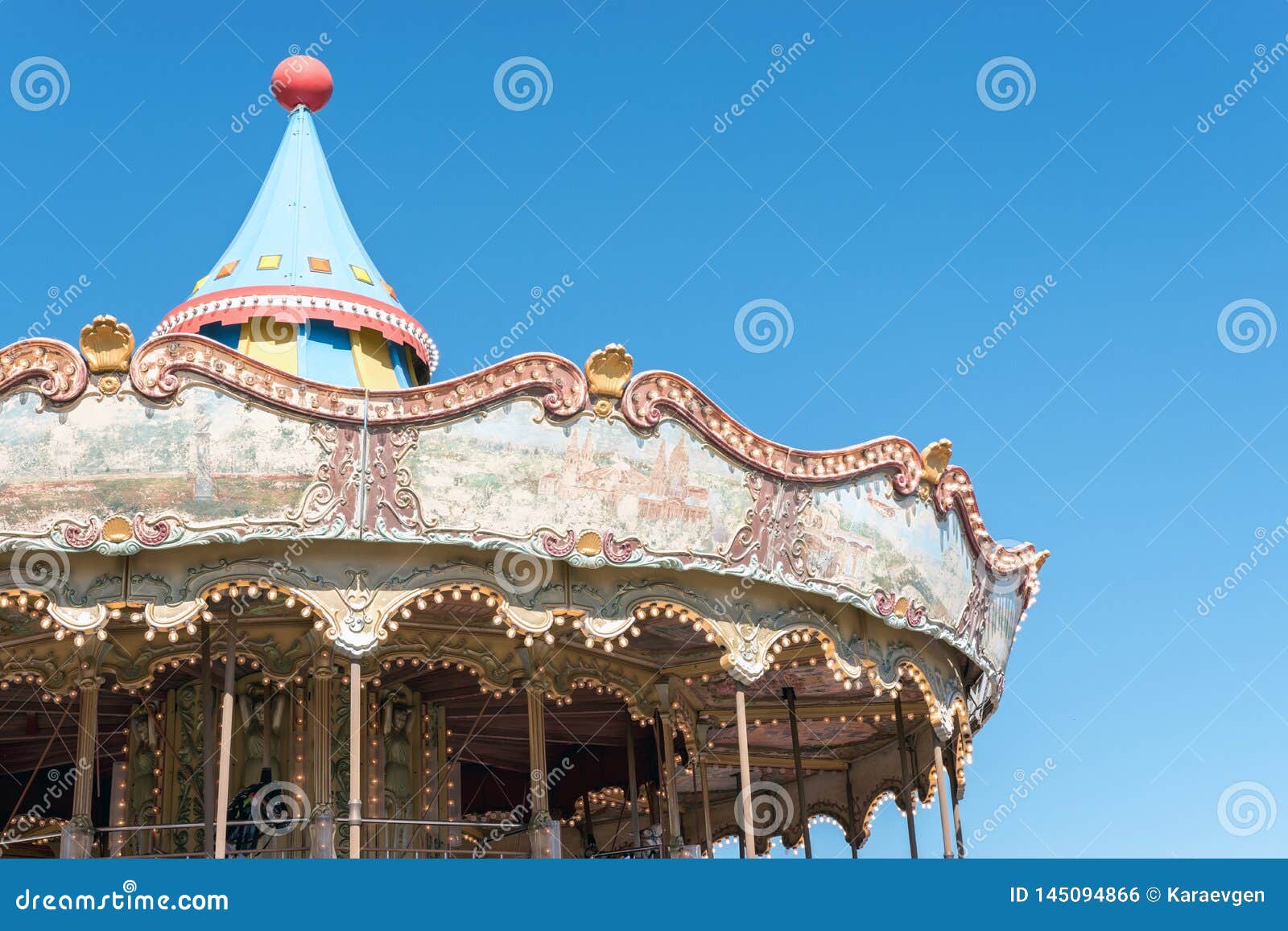 Antique Carousel in the Amusement Park on Background of Blue Sky Stock ...