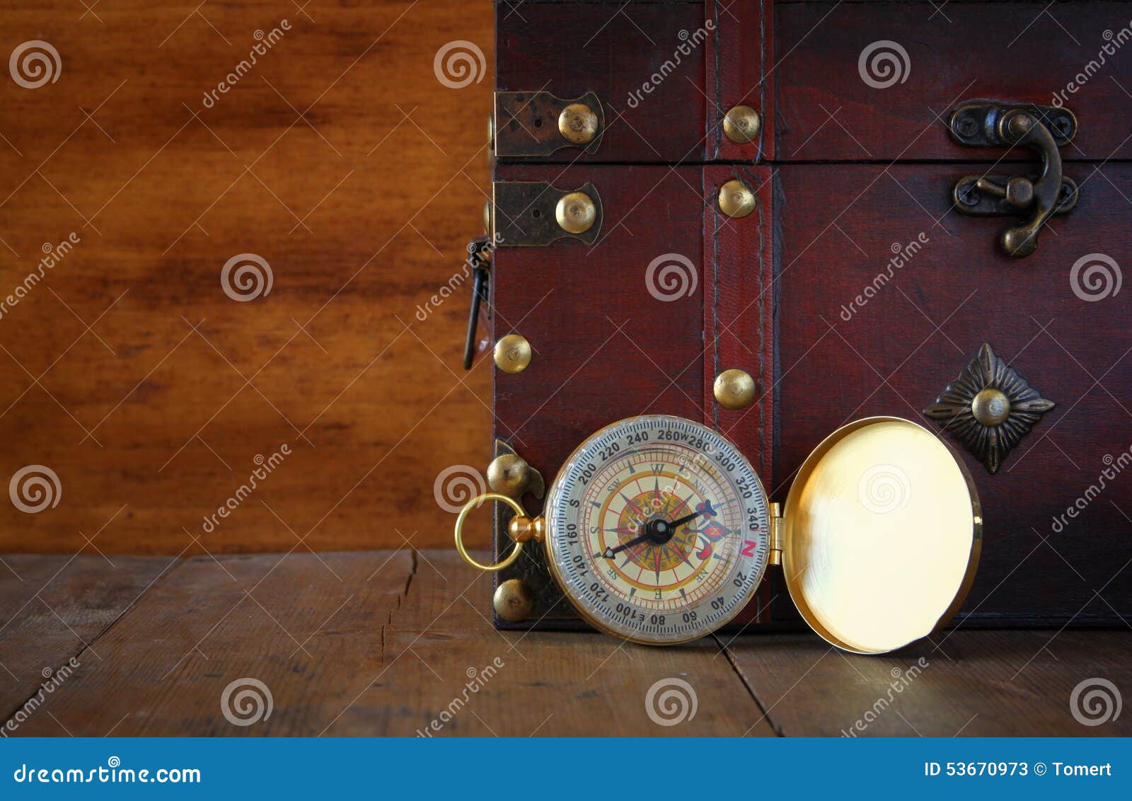 Antique Compass on Wooden Table Stock Image - Image of container ...