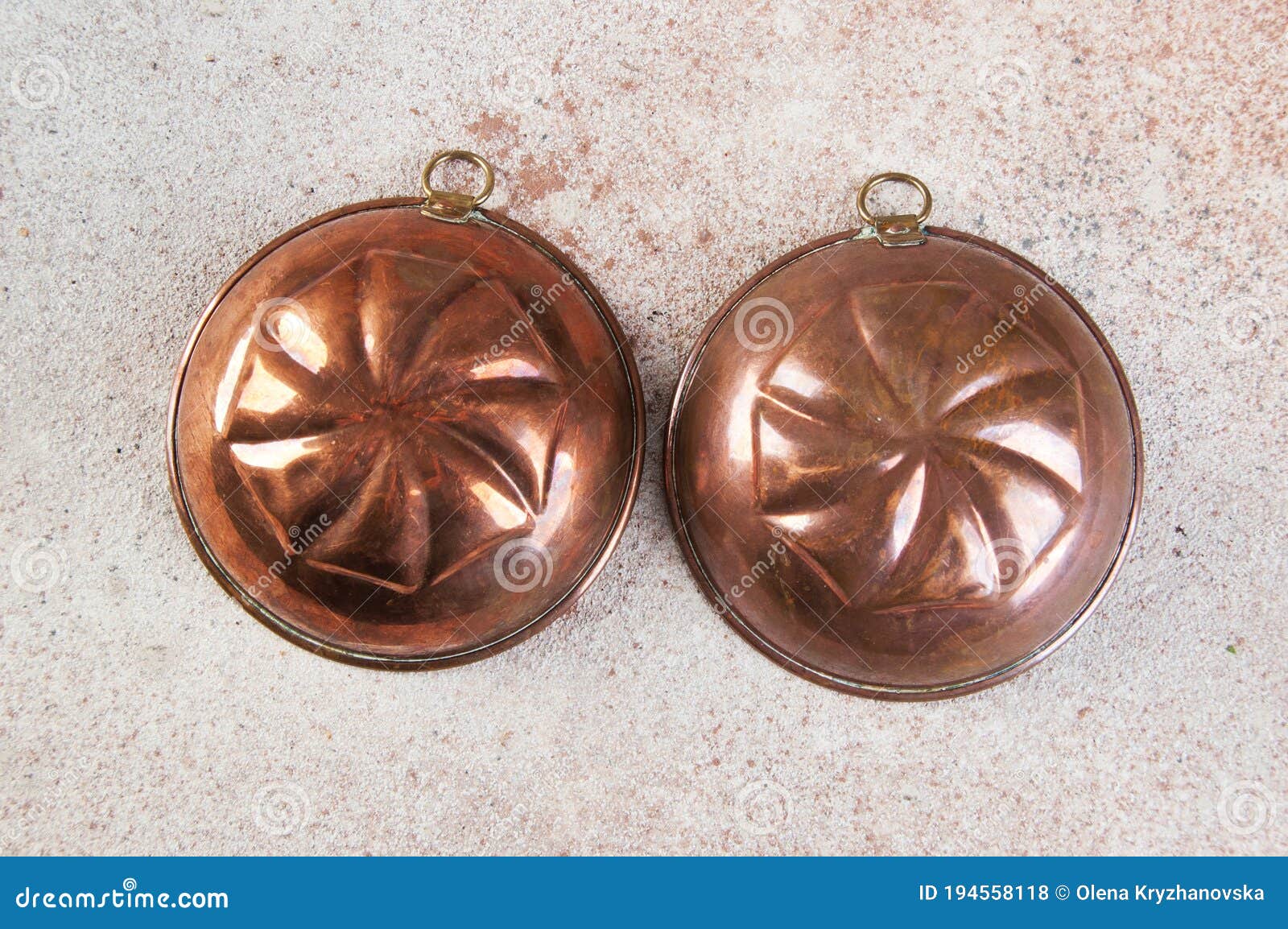 Antique Copper Molds on a Concrete Background Stock Photo - Image of ...