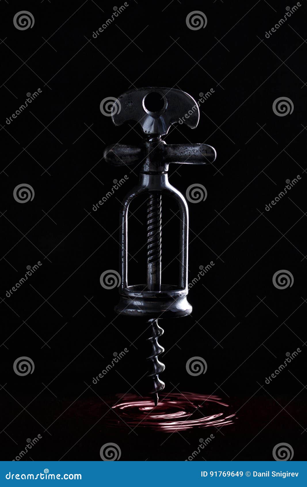 Antique Corkscrew Hanging in the Air on a Black Background. an Ancient ...
