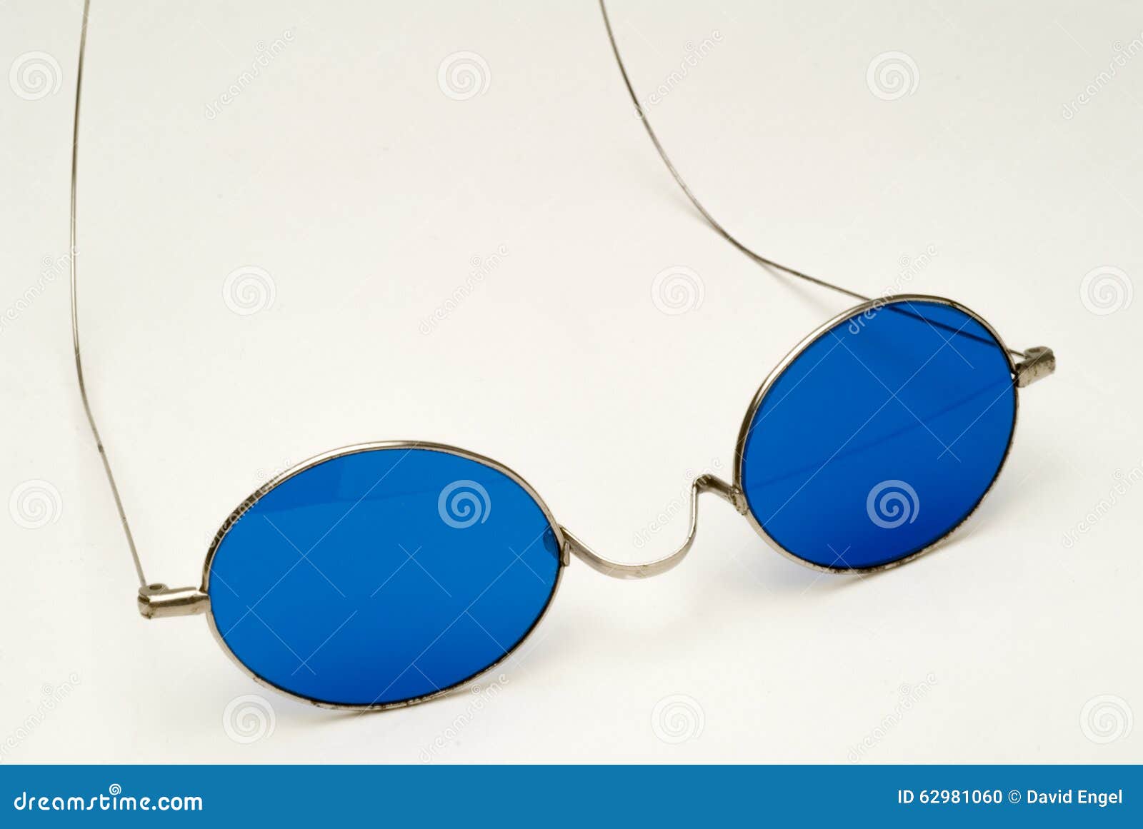 Antique Eyeglasses with Blue Lenses and Wire Frame Stock Photo - Image ...