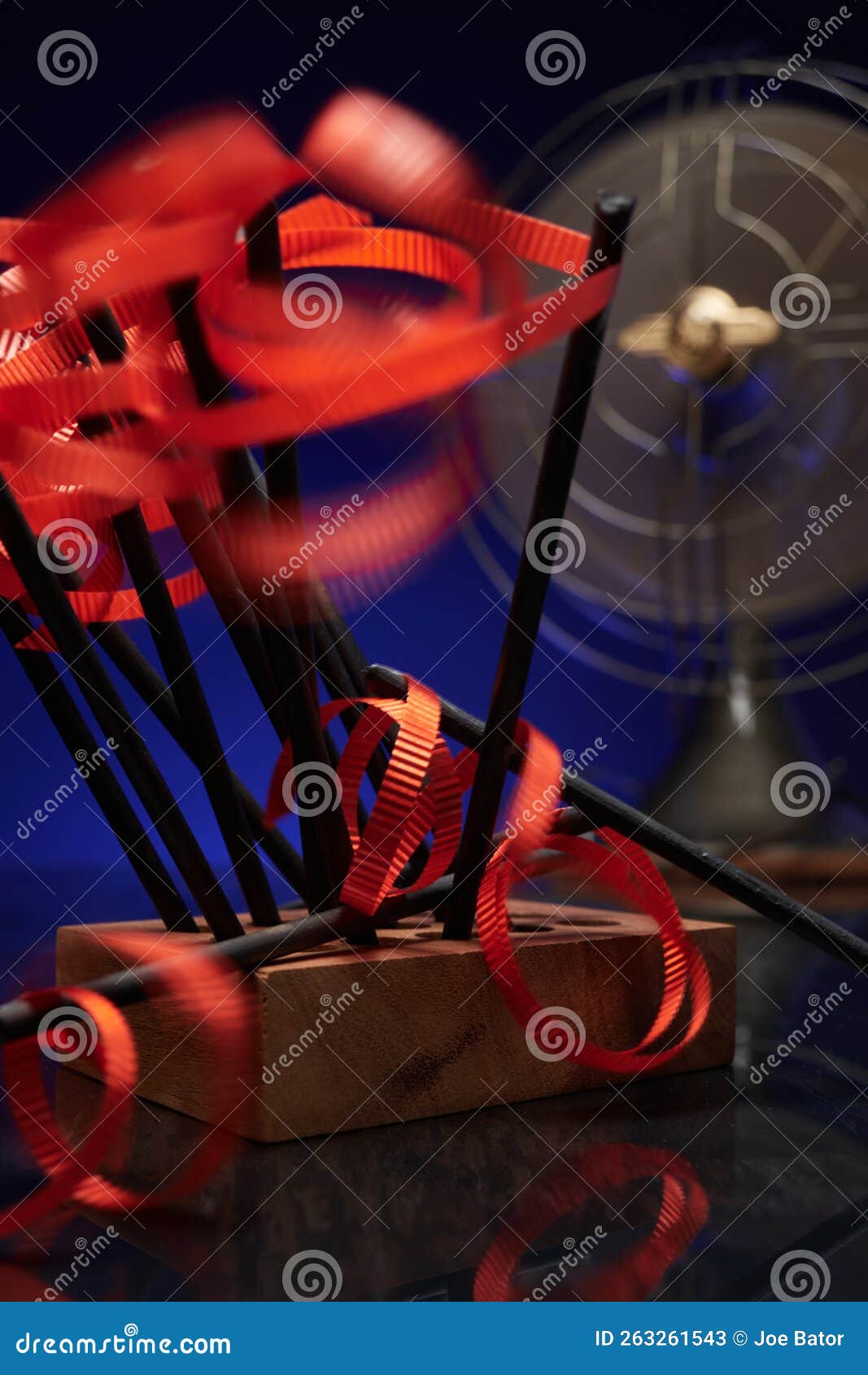 Antique Fan Blowing Red Ribbons Stock Image - Image of force, blur ...