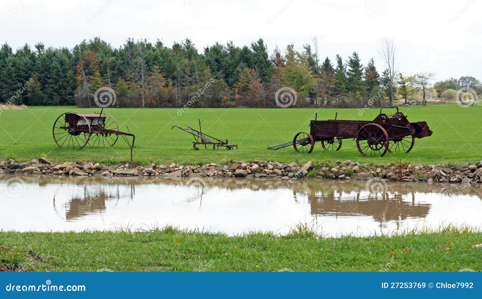 Antique Farm Equipment stock image. Image of pond, retro - 27253769