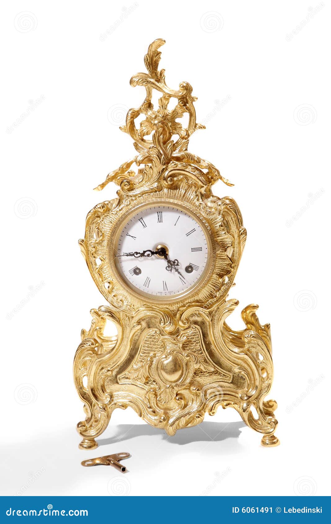 Antique goldish clock. stock image. Image of front, face - 6061491